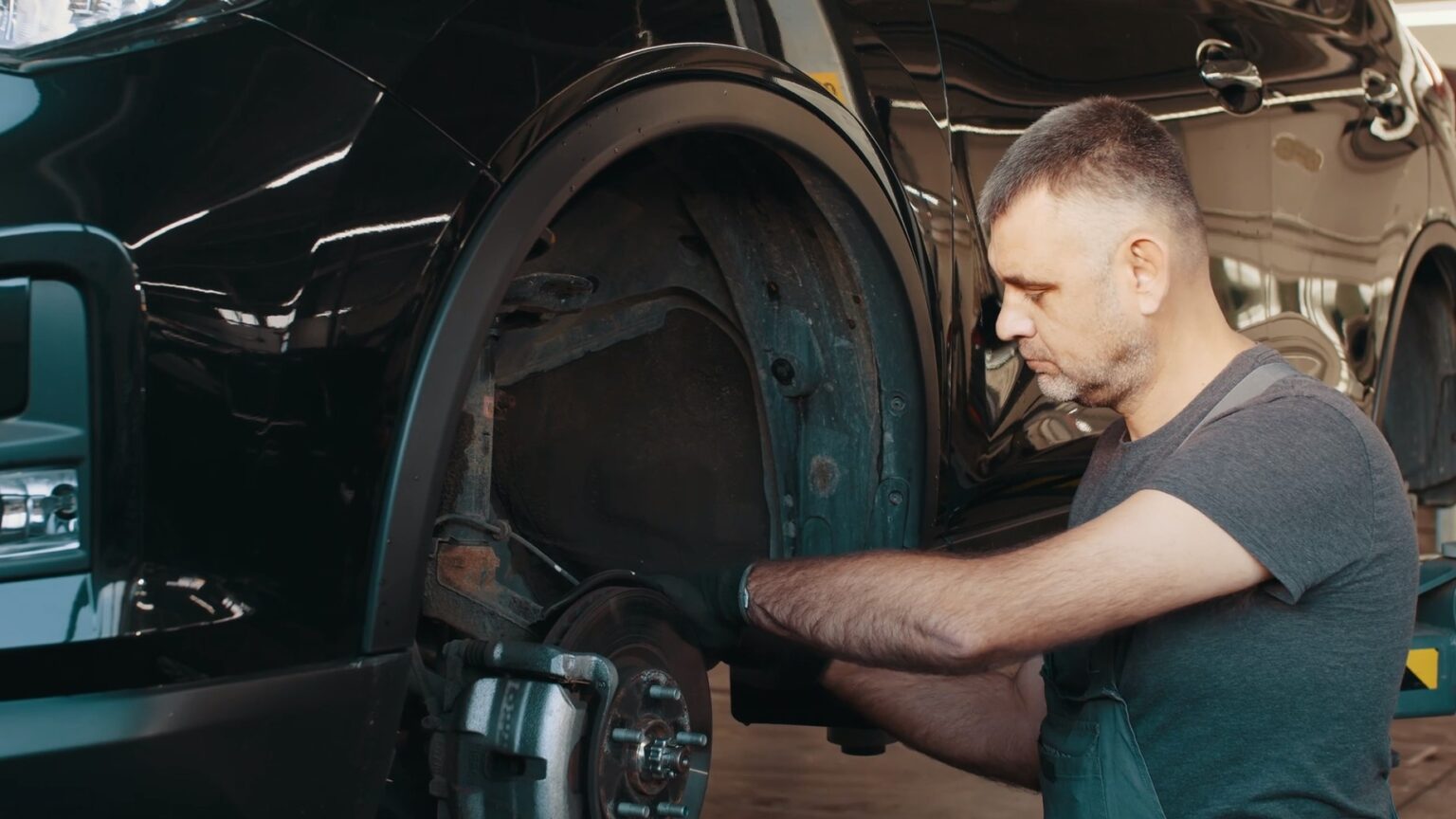 What Does It Mean If Car Brakes Squeak When Backing Up? Causes and ...